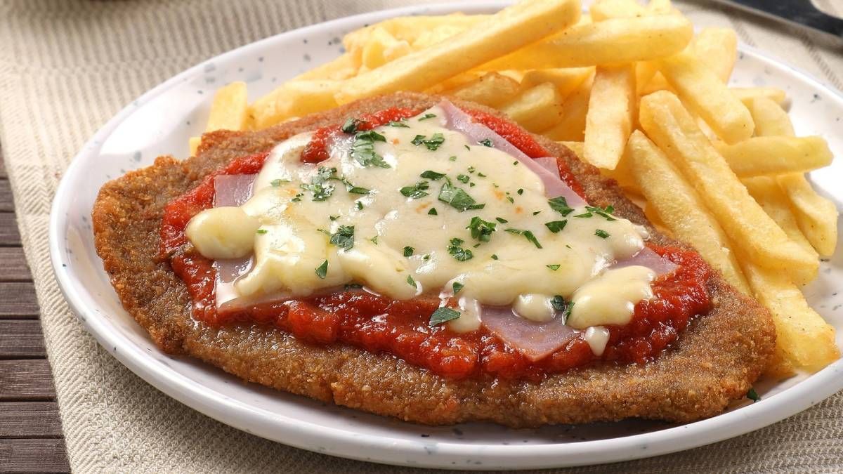 La receta de la milanesa napolitana deliciosa y sus secretos